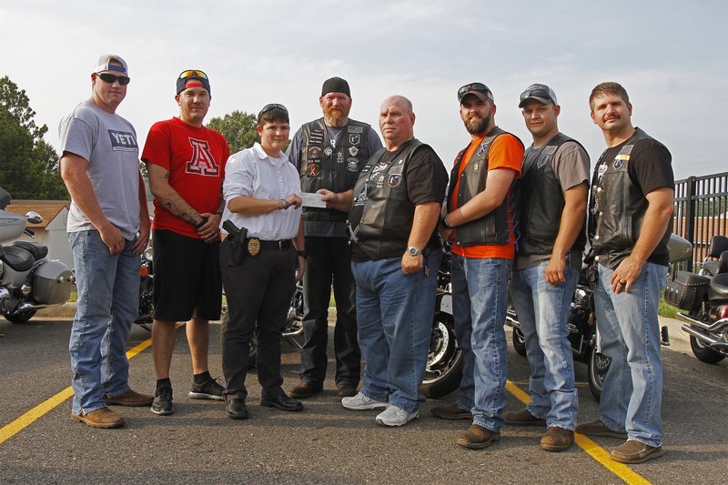 Defenders motorcycle club benefit ride raises money for sick officer ...