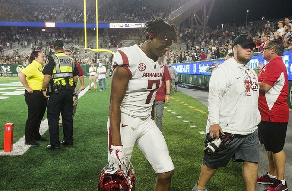 Razorbacks lose 27-9 lead, then game to Rams