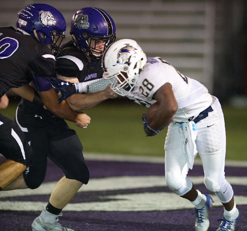 PREP FOOTBALL: West holds on for first win