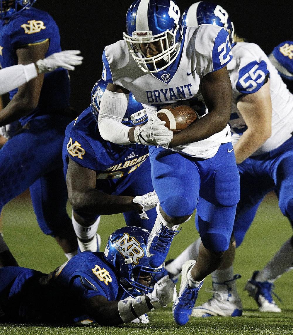 Bryant bucks trend, reaches goal