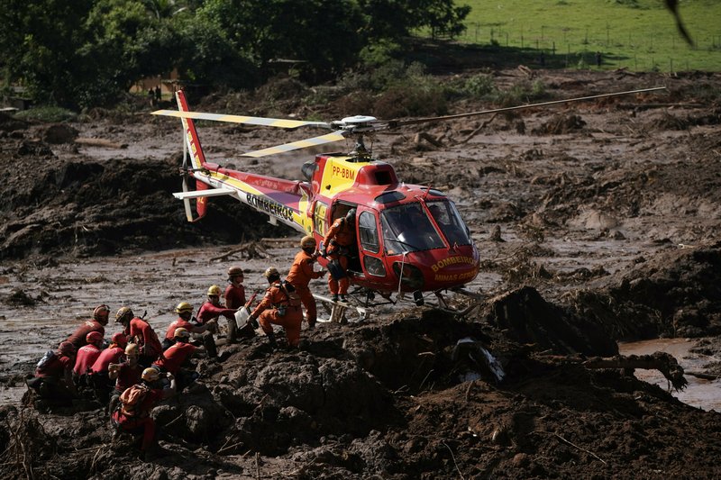 Brazil firefighters search mud after dam collapse; 60 dead | Hot ...