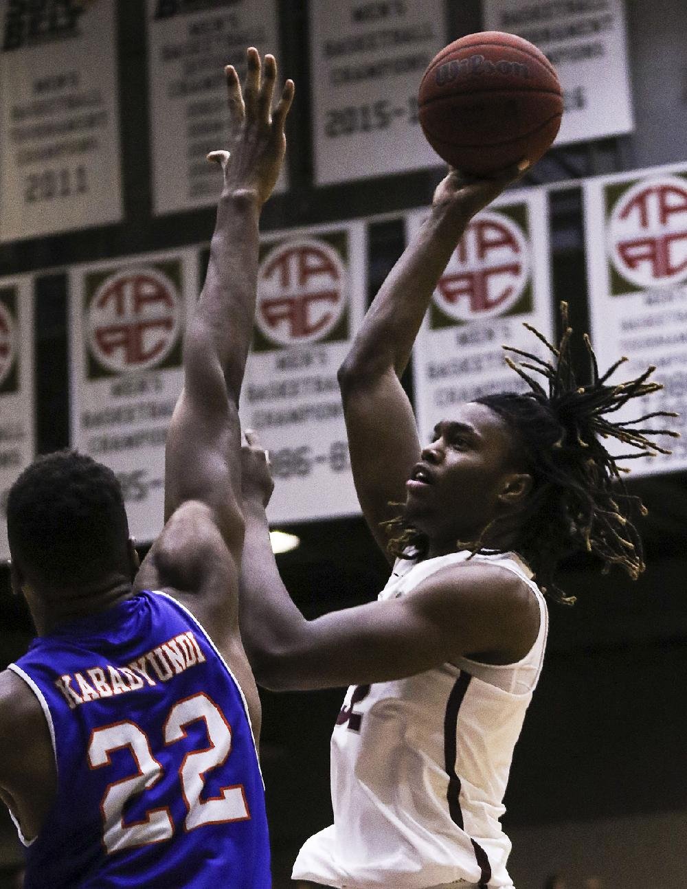 Dunking his way: UALR’s Bankston on target in close