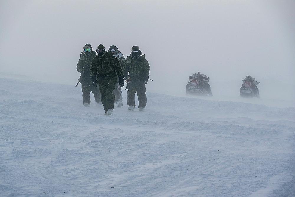 In Arctic military drills, troops fight Russians, cold