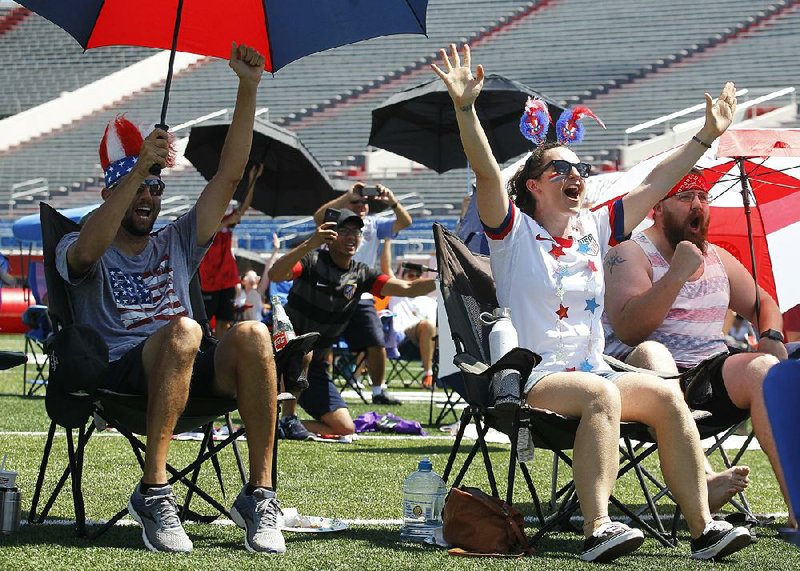 Soccer fans gather at Little Rock's War Memorial Stadium to cheer title ...
