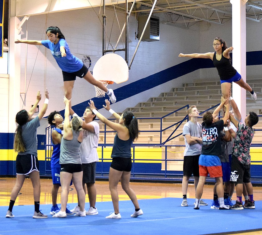 Decatur cheer team works on new stunts | Westside Eagle Observer