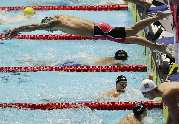 Dressel wins record eighth medal