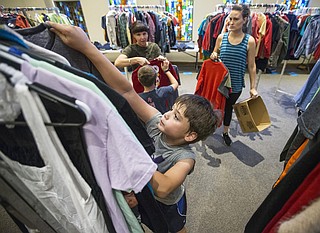 PHOTO GALLERY: Clothes being prepared for giveaway | Northwest Arkansas ...