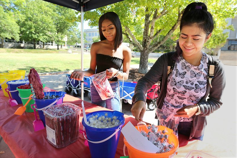 PHOTO GALLERY: Candy for students, learning bus safety, giving for ...