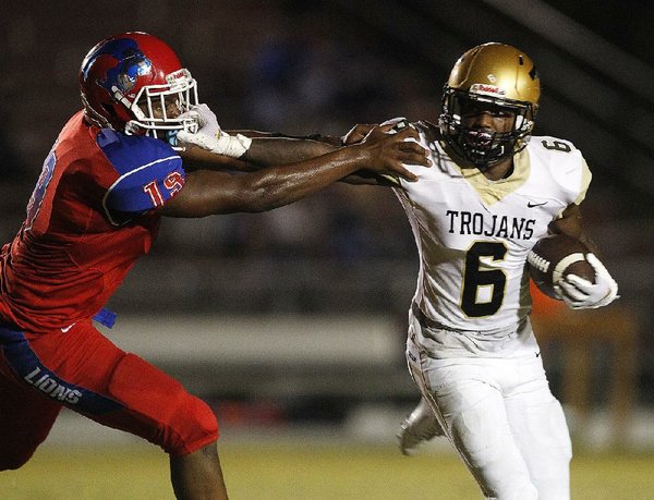 Shelor on the money for Trojans | The Arkansas Democrat-Gazette ...