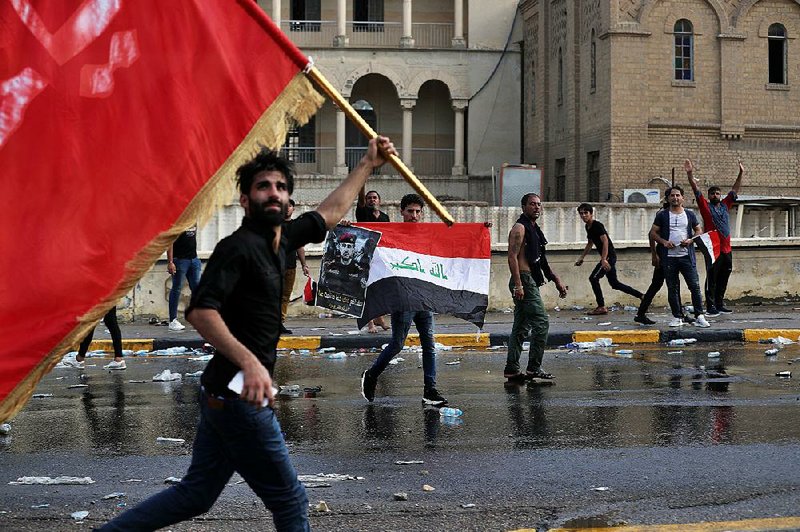 Iraq protest clashes claim 2 lives | The Arkansas Democrat-Gazette ...