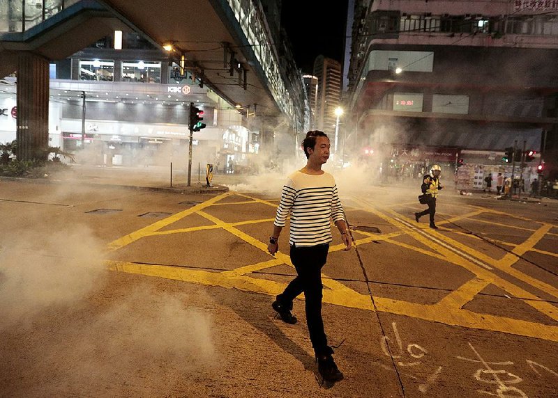 Protesters strike China news office | The Arkansas Democrat-Gazette ...