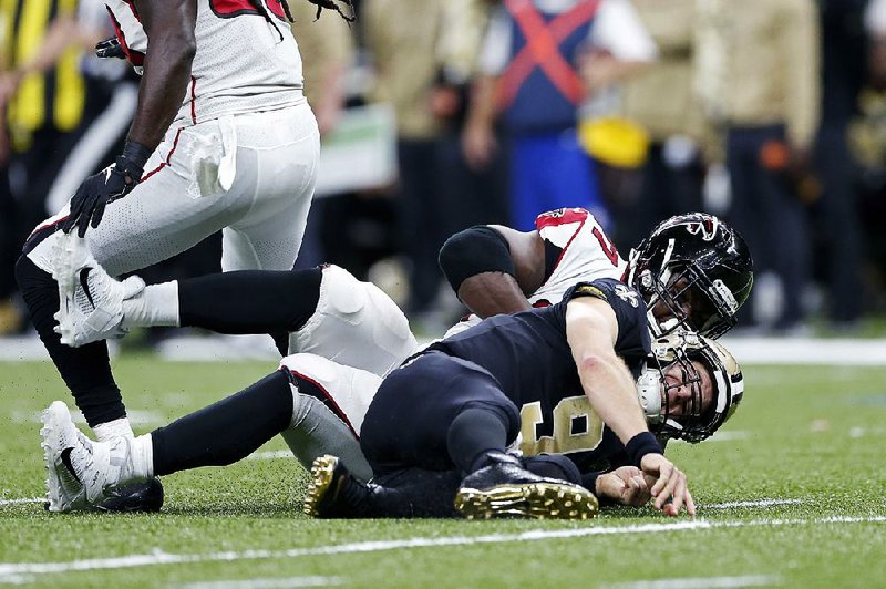 Visiting Falcons stun first-place Saints