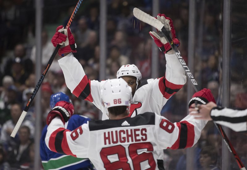 Devils strike fast, hold off Canucks 2-1 | Hot Springs Sentinel Record