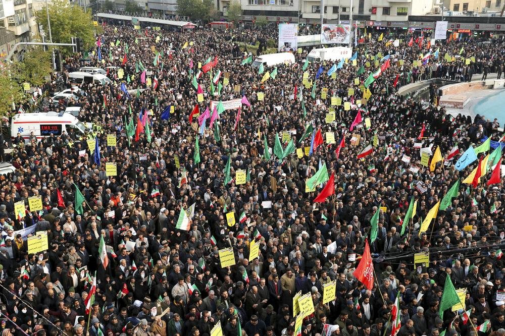 Demonstrators attend a pro-government rally in Iran