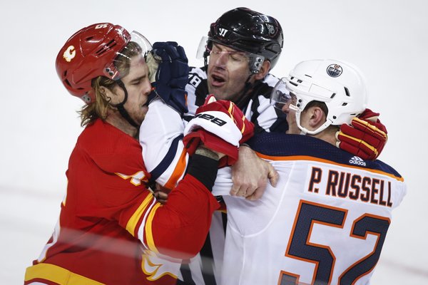 McDavid scores 2, Oilers beat Flames 8-3 as goalies fight | Hot Springs ...
