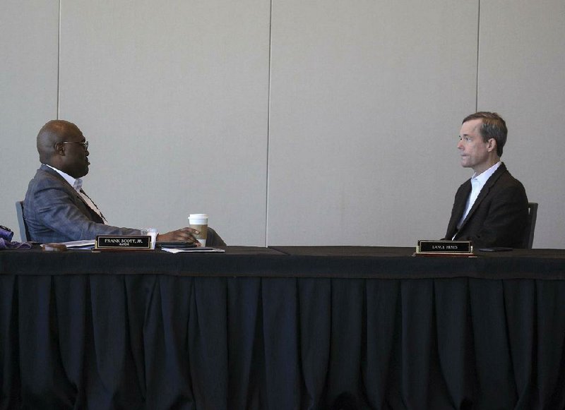 Little Rock unveils initiatives to stem virus's effects; businesses ...