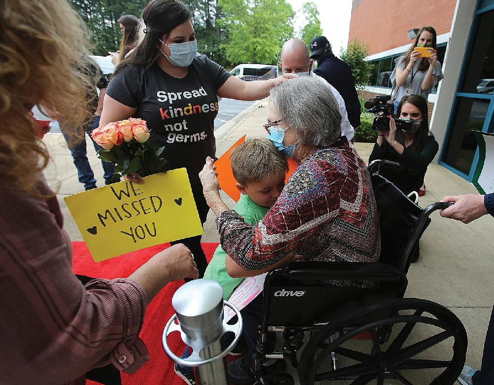 Patient of 40+ days rolls out of hospital amid cheers, tears | The ...