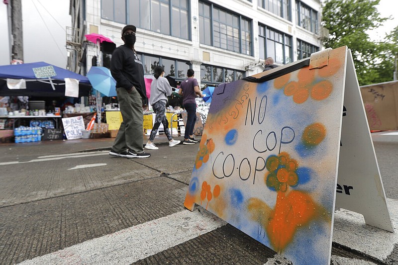Protesters stake out festive zone in Seattle | The Arkansas Democrat ...