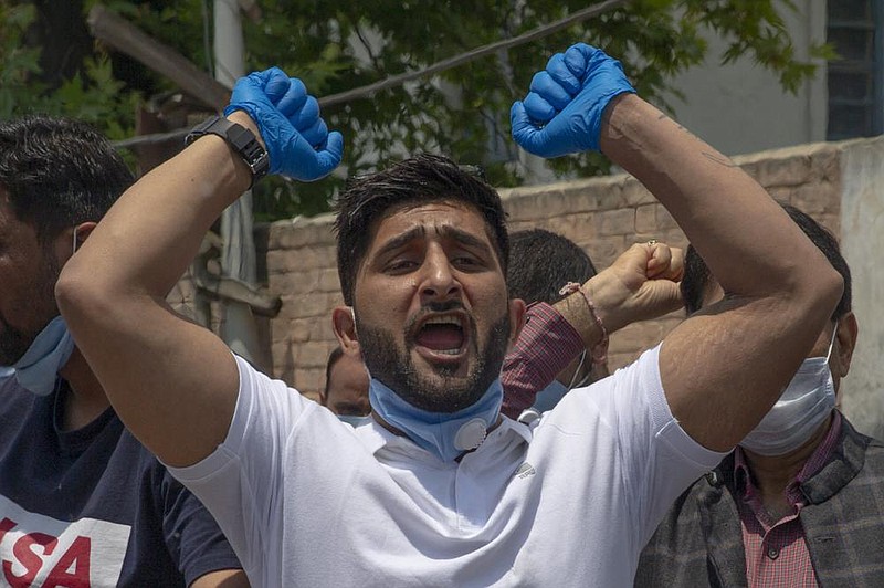 India's Modi: Nation 'hurt, angry'