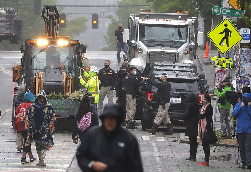 Seattle cops dismantle 'occupied' zone, arrest more than 30 | Northwest ...