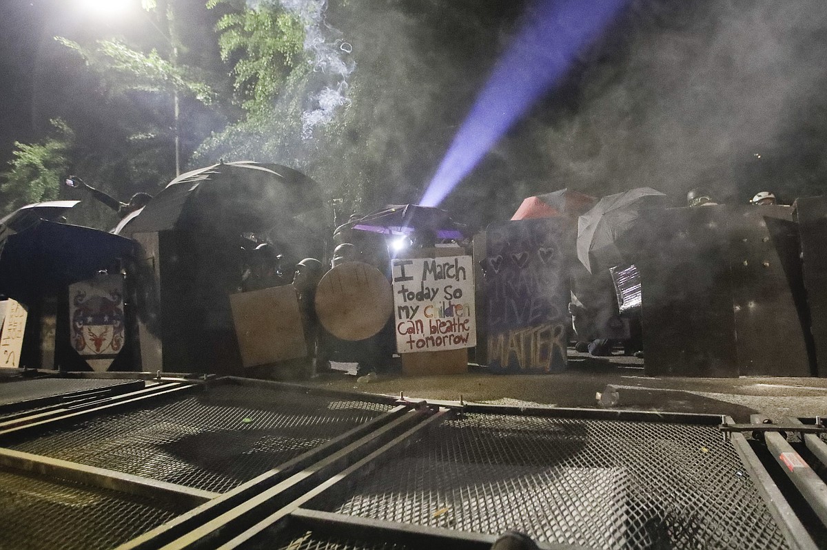 Portland protesters breach fence around federal courthouse | The ...