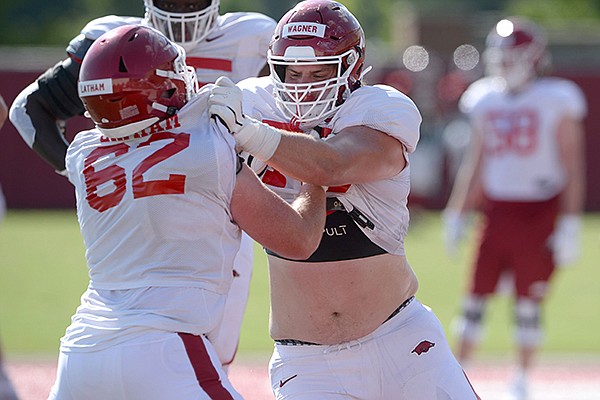 Hogs hit head-on after long hiatus | Northwest Arkansas Democrat-Gazette