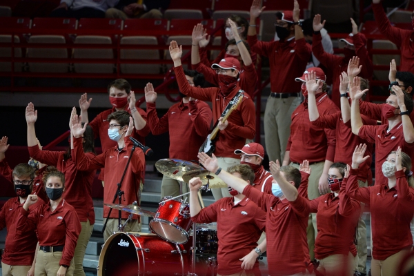 WholeHogSports - Arkansas band brings the noise in different way
