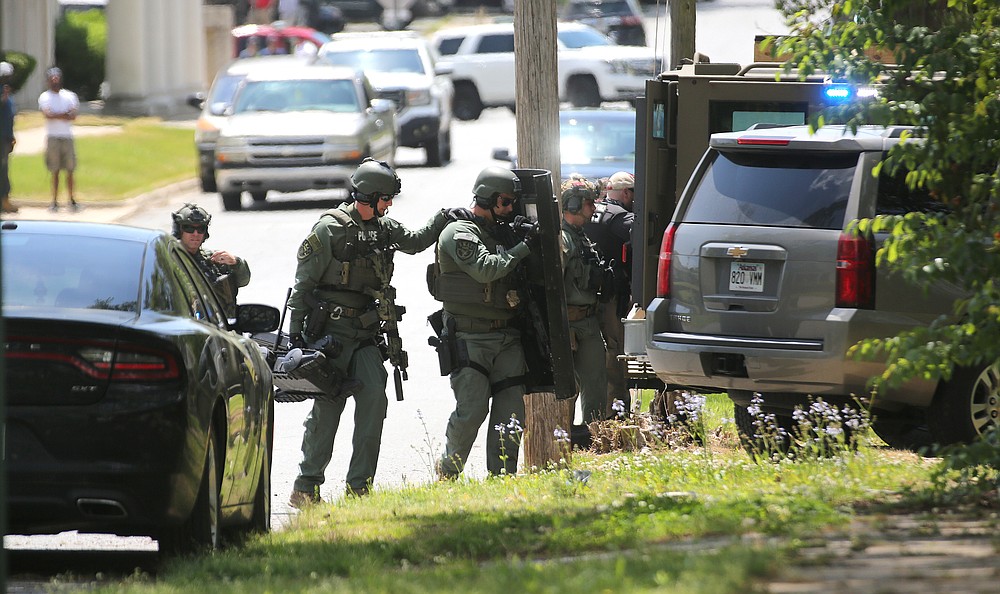 SWAT Teams Raid House in NLR | The Arkansas Democrat-Gazette - Arkansas ...