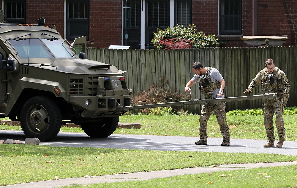 SWAT Teams Raid House in NLR | The Arkansas Democrat-Gazette - Arkansas ...
