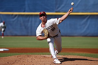 Lockhart nearly perfect, leads Arkansas to tournament win over Georgia ...