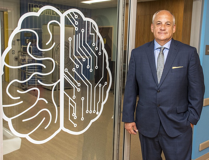 HIGH PROFILE: Dr. Gregory Baker Sharp puts kids first, going above and ...