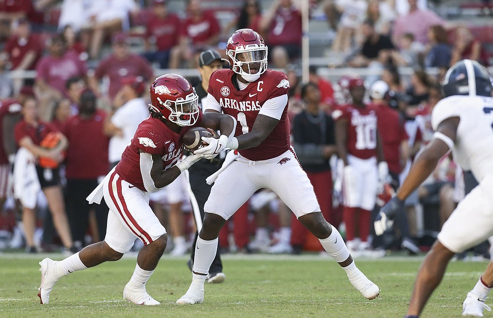 Headaches aplenty: No. 20 Hogs show muscle, roll up 633 yards