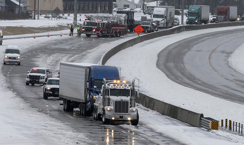 Jackknifed trucks, galloping power lines add to Arkansas winter weather ...