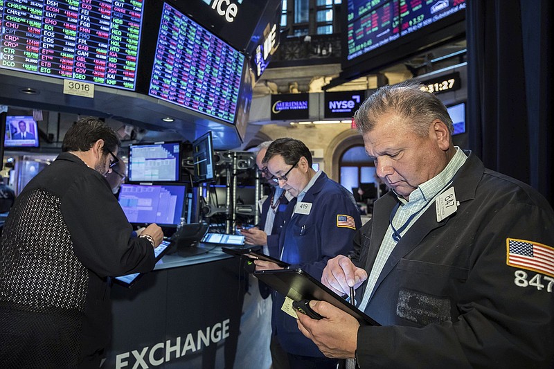 Wall Street closes first losing week after 3-week rise | The Arkansas ...