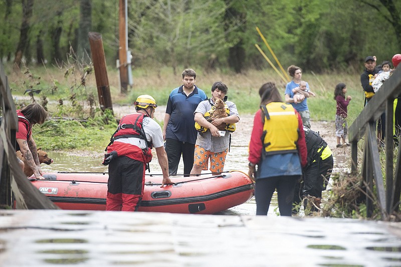 Flooded roads, water rescues keep first-responders busy in Northwest ...