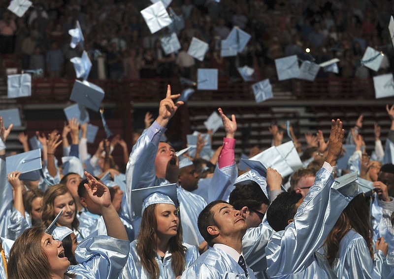 Students earning high school diplomas, college degrees on the same day ...