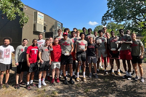 Assisting others part of Hogs' team bonding | Whole Hog Sports