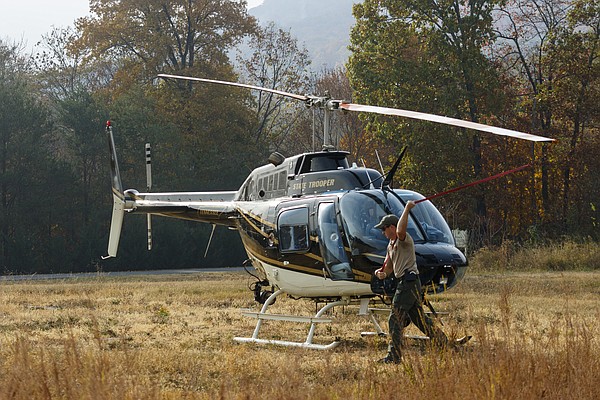NTSB report: Witness saw helicopter clip TVA power line before it spun ...