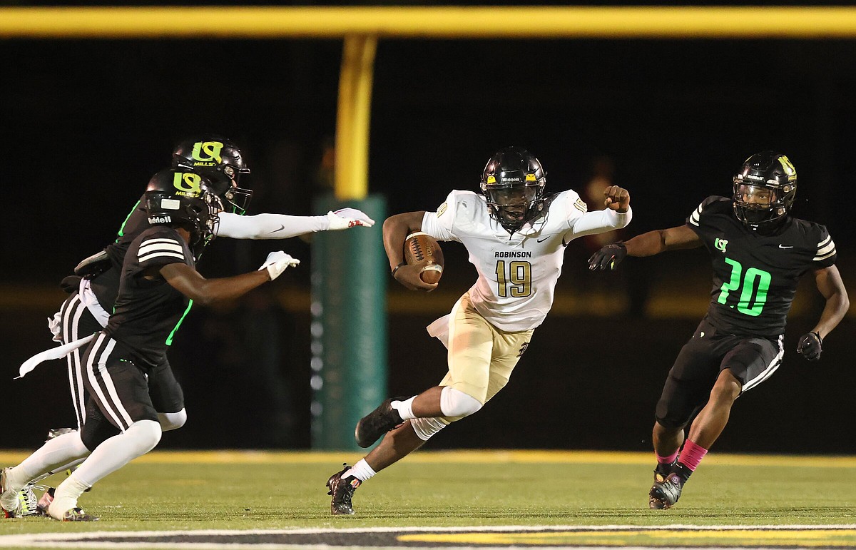 PREP FOOTBALL: Robinson makes late stop to edge Mills | Northwest ...