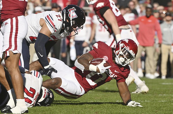 Tackled for a loss: Run game wrangled by Flames | Whole Hog Sports