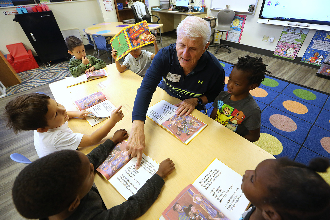 North Little Rock Rotary Club, volunteers give 574 personalized books ...