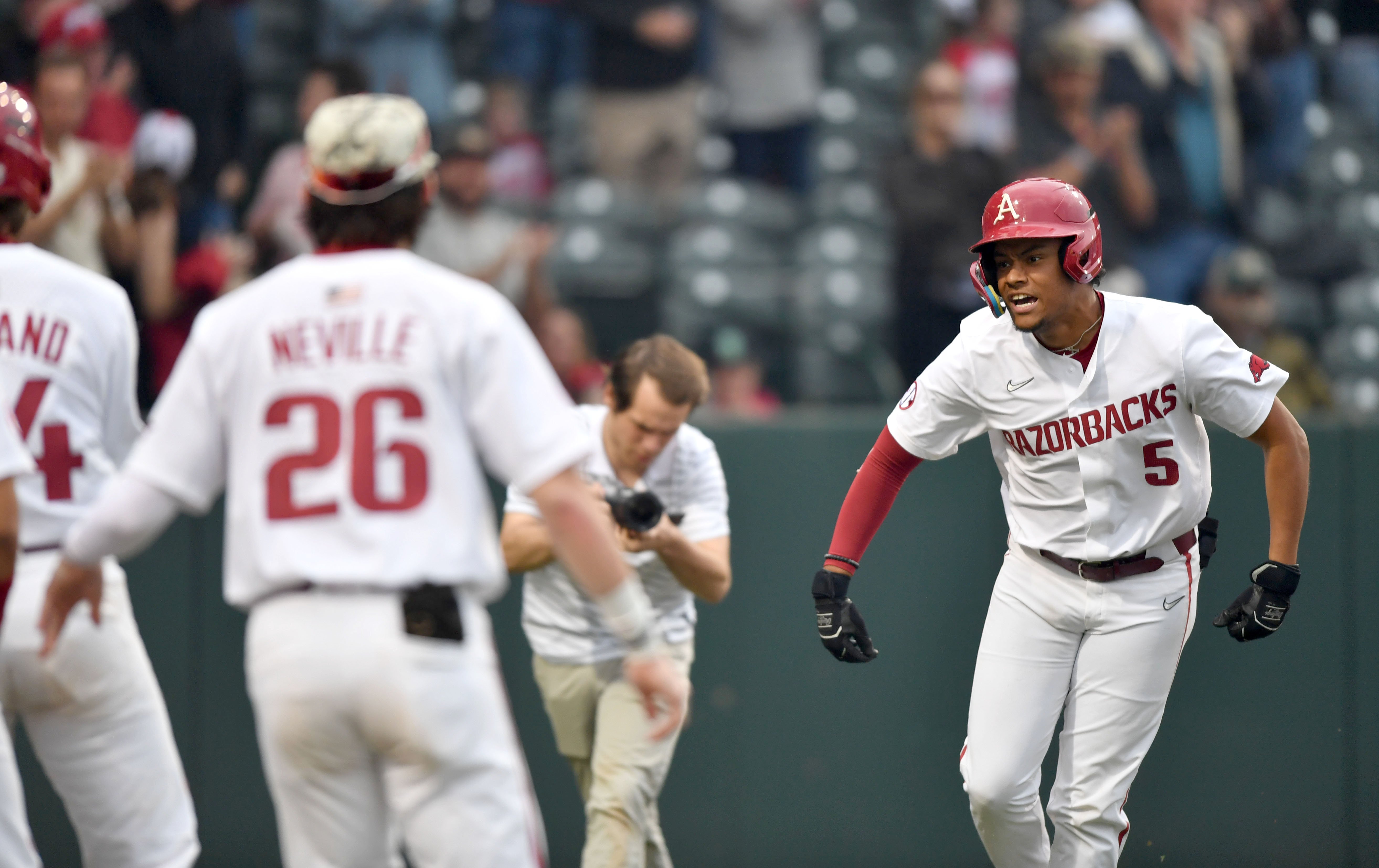 WholeHogSports - Hogs top Army with 'beautiful' swing by Diggs