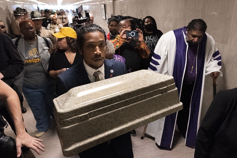 Gun safety demonstrators carry caskets to Tennessee Capitol ...