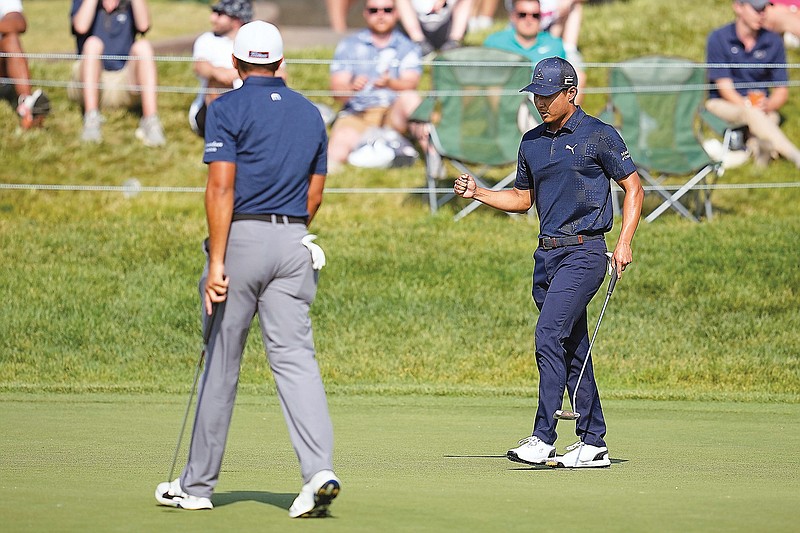 Suh, Matsuyama ride hot putters on steamy day at the Memorial ...