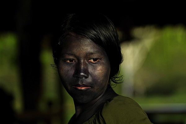 An Amazon rainforest rite of passage in threatened territory ...