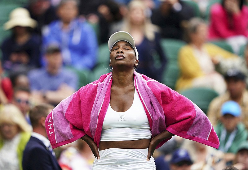 V. Williams falls early in her first match at her 24th Wimbledon and ...