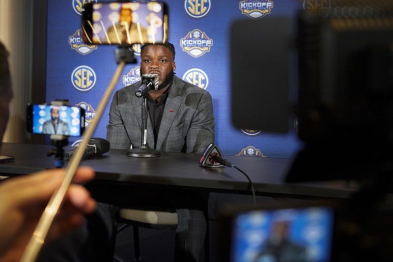 Dynamic duo: Sanders, KJ carry star power for Hogs | Northwest Arkansas ...