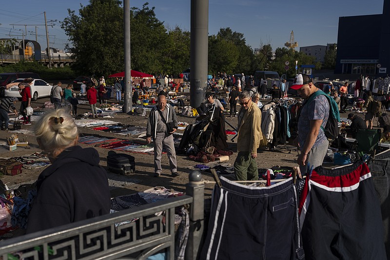 A cherished weekend flea market in the Ukrainian capital survives ...