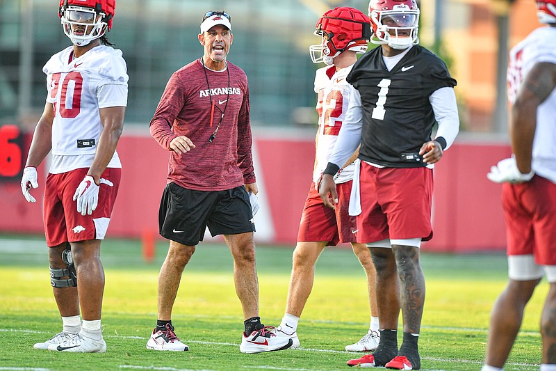 Optimistic Enos: Hogs’ OC offers insight on progress at camp ...
