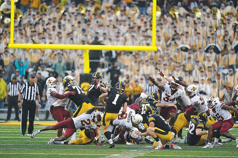 As college football arrives, schools pay monitors to stop players and ...